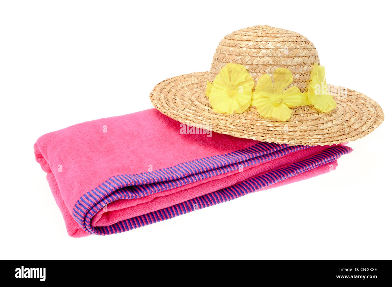 Pink beach towel and a ladies sun hat on a white background Stock Photo ...