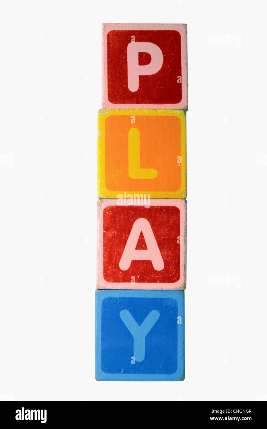 assorted childrens toy letter building blocks against a white ...