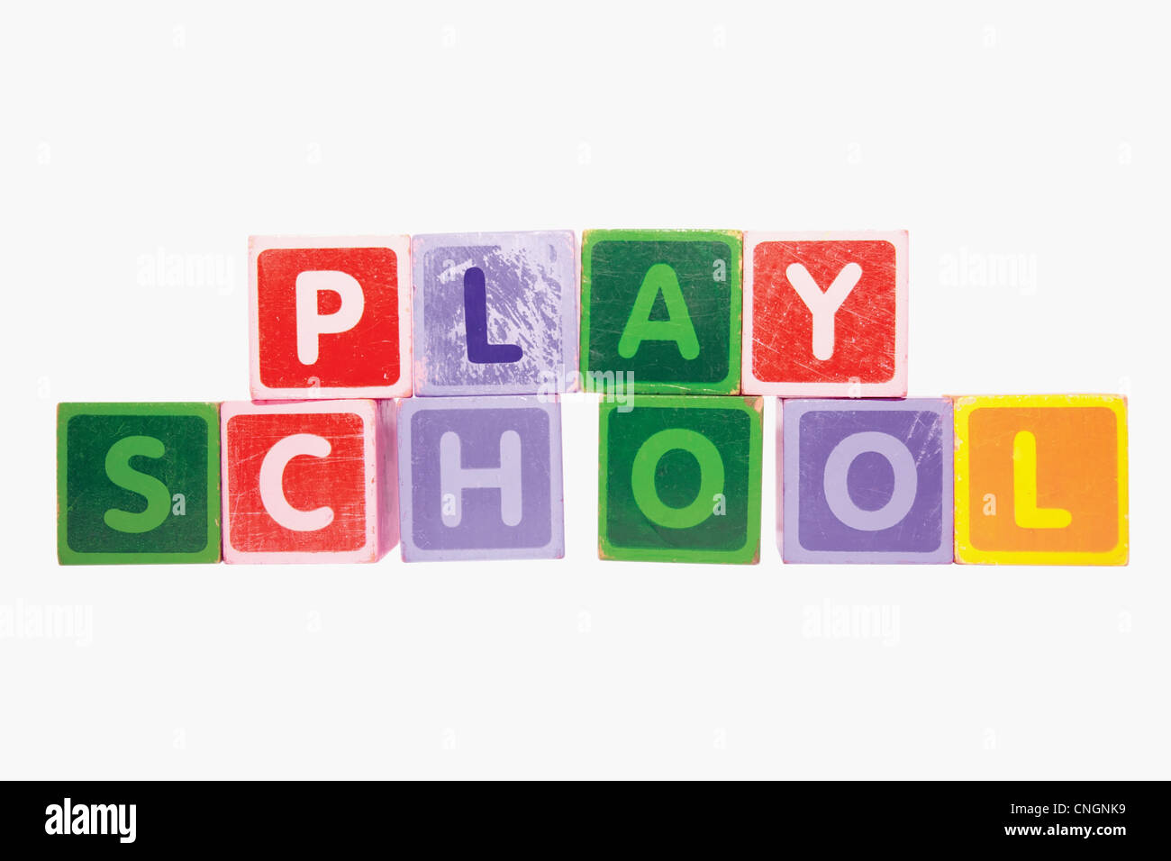 assorted childrens toy letter building blocks against a white ...