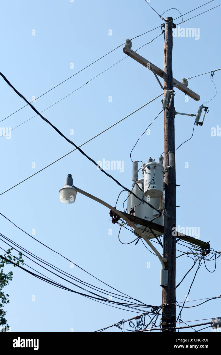 Cluttered power pole, New Orleans Stock Photo - Alamy