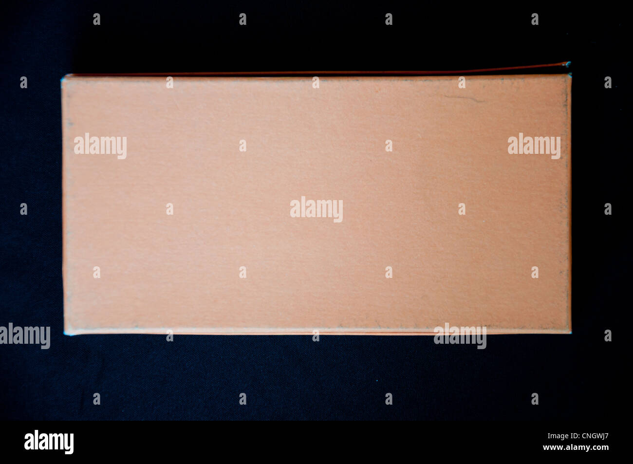 old box on black background Stock Photo - Alamy