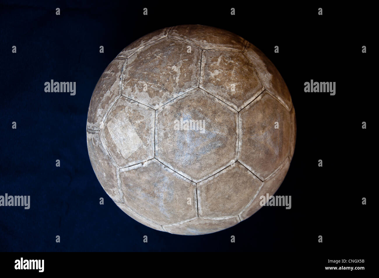 old football on black background Stock Photo - Alamy