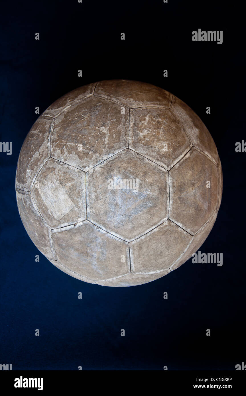 old football on black background Stock Photo - Alamy