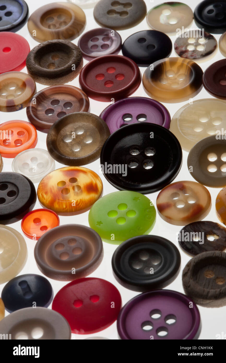 A range of different sized and coloured buttons Stock Photo - Alamy