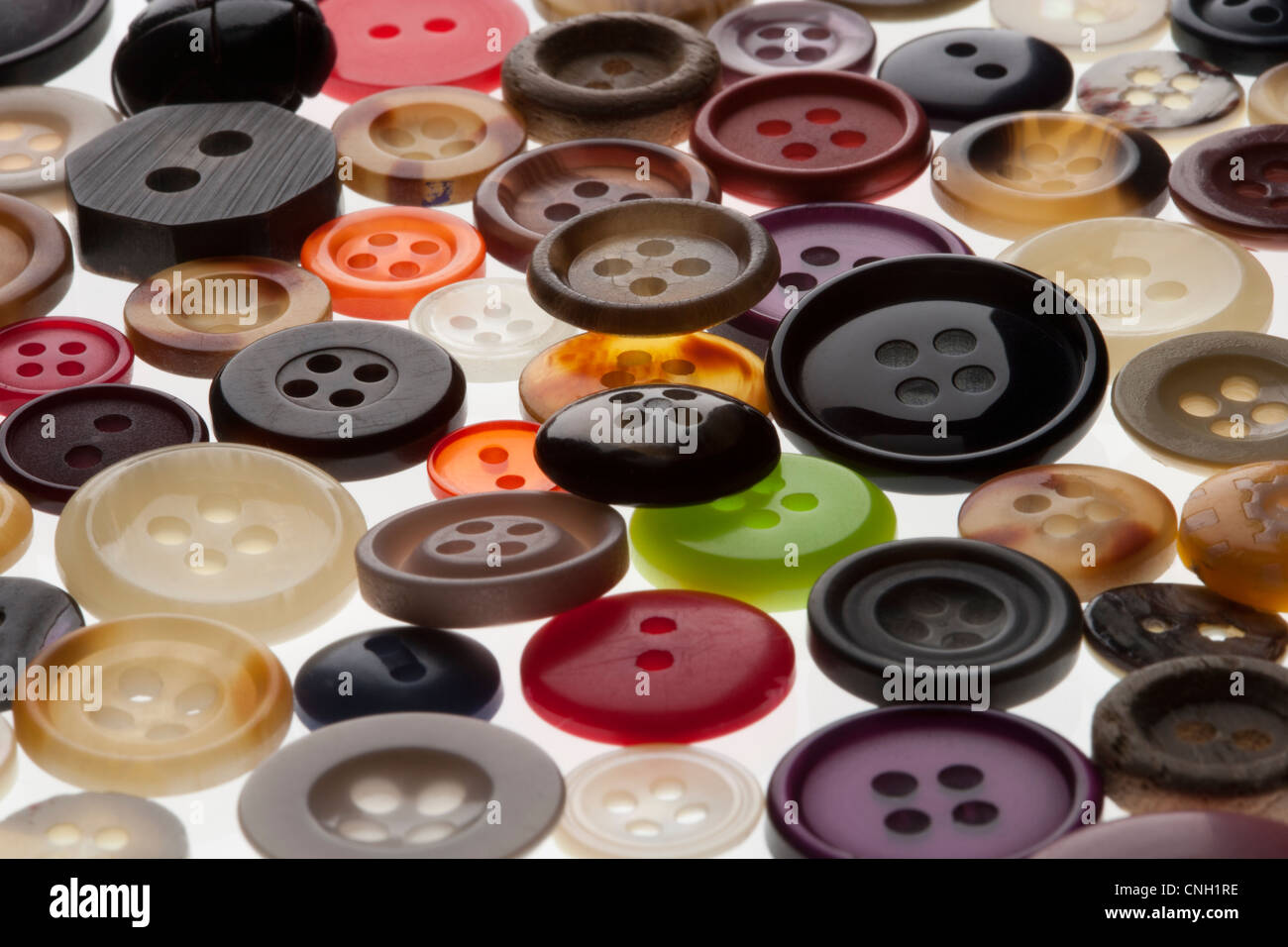 A range of different sized and coloured buttons Stock Photo - Alamy