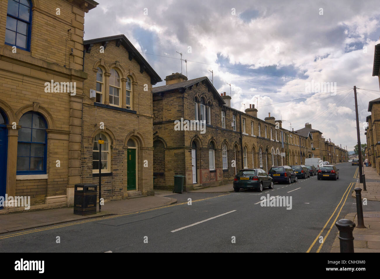 Smart terraced housing on the main route through the village of ...