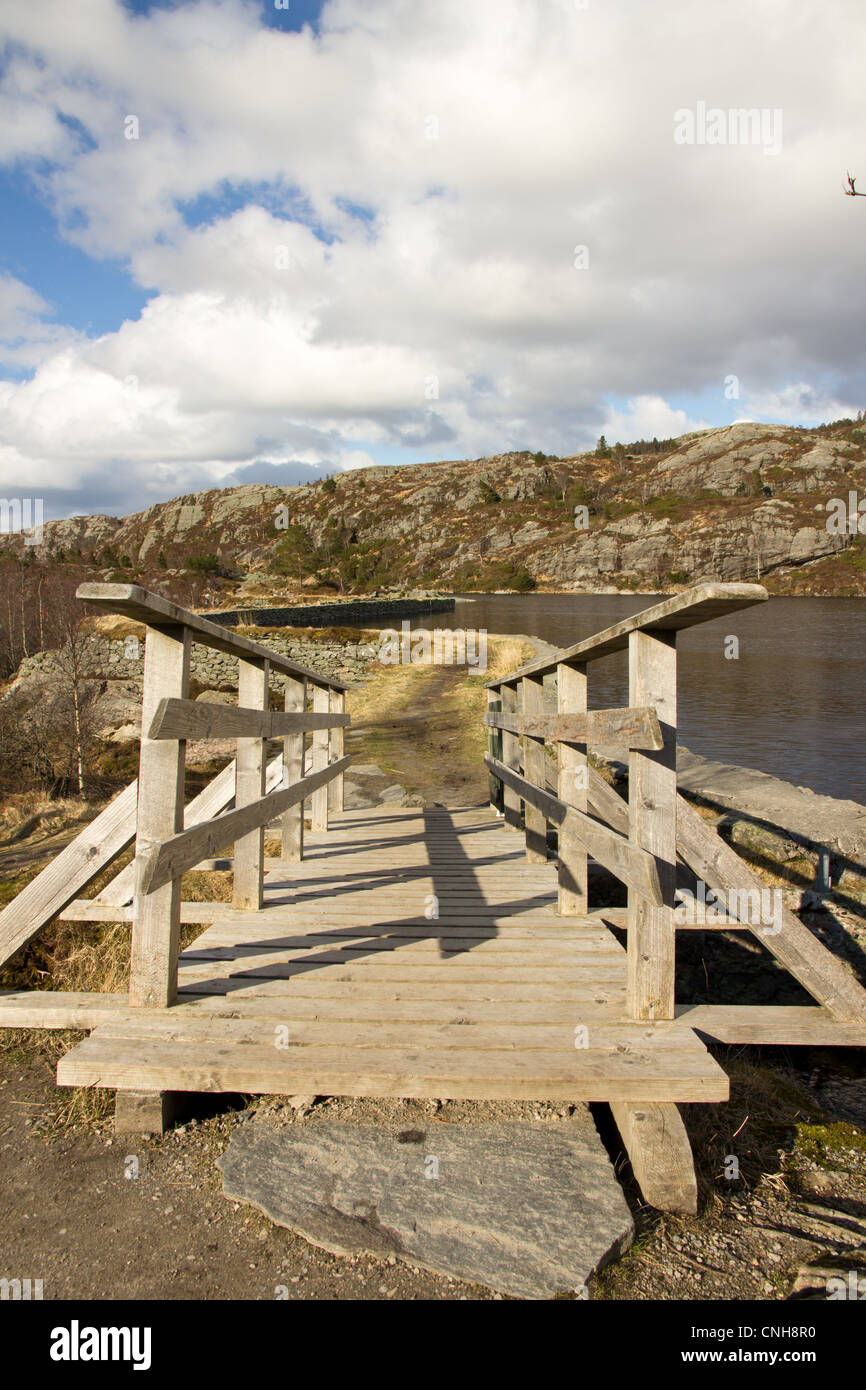 Picture of a pathway with a bridge on a mountain Stock Photo - Alamy