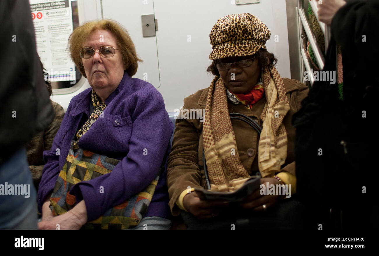 Passengers ride the New York subway. In 2010, the New York subway ...