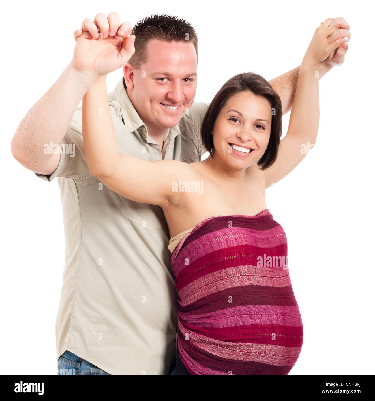 Portrait of happy couple expecting baby, isolated on white background ...