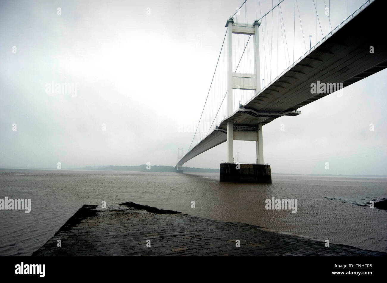 The old Severn Bridge with the old Aust Ferry slipway in the foreground ...