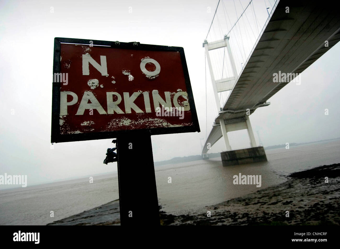 No Parking sign on the old Aust Ferry slipway with the old Severn ...