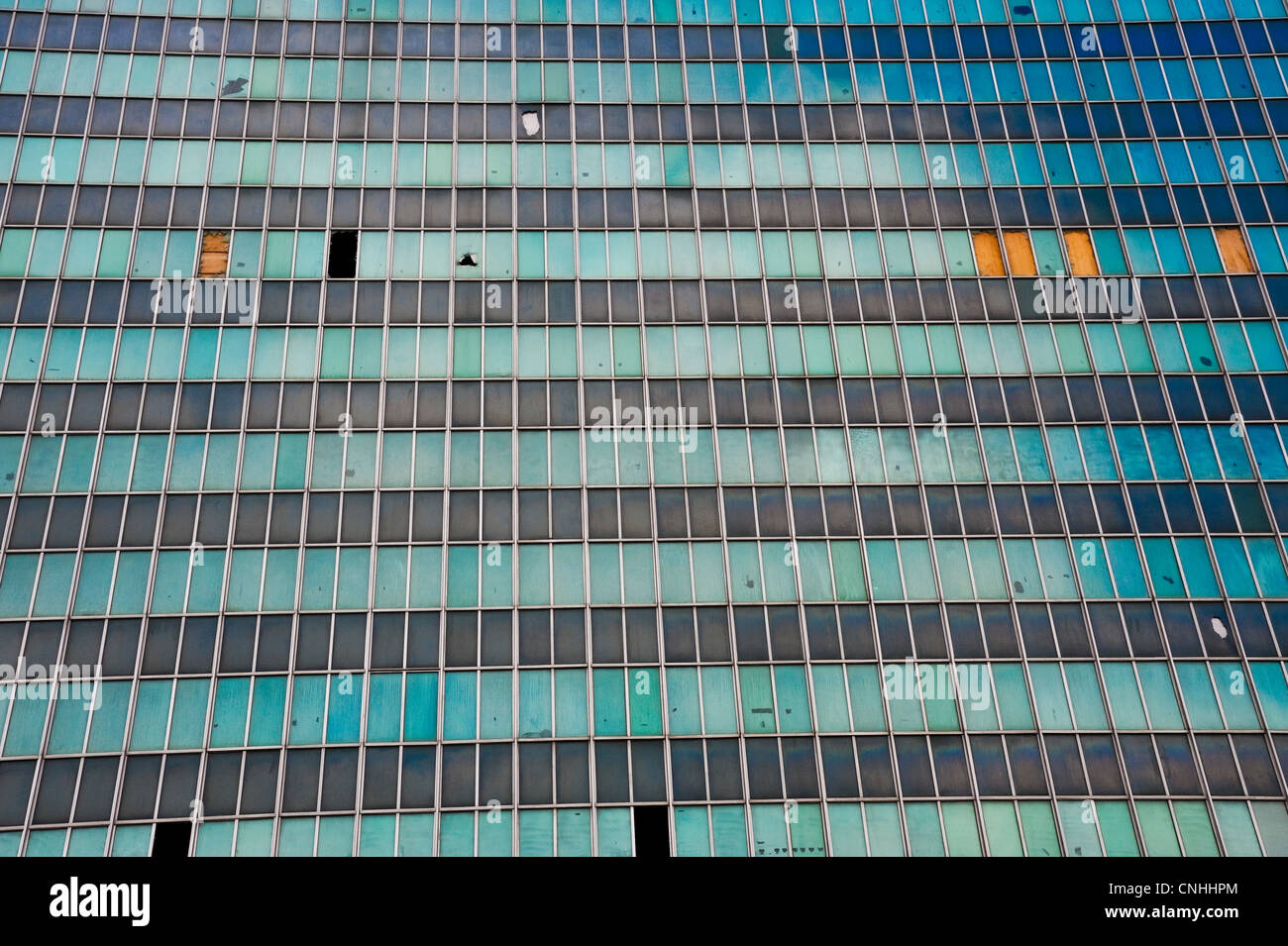 Rundown office building with broken out windows Stock Photo - Alamy