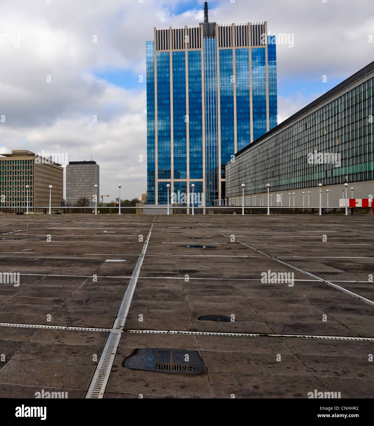 Office building with square in the foreground Stock Photo - Alamy