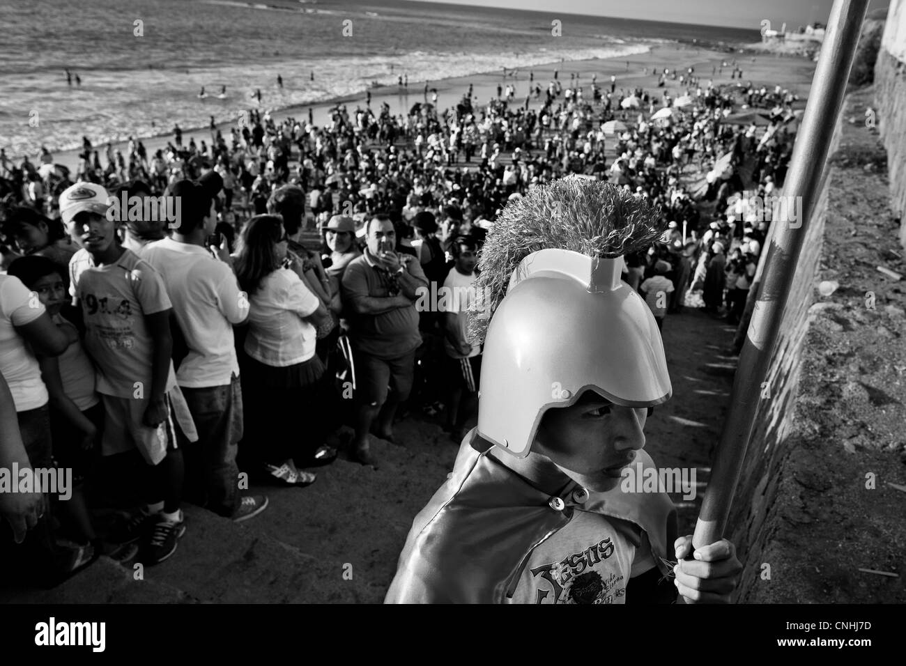 A young Catholic follower performs a Roman soldier during the annual ...