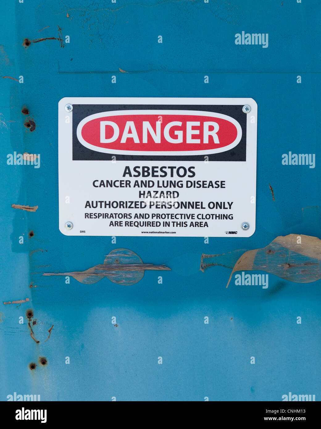 Asbestos warning sign posted on door Stock Photo - Alamy
