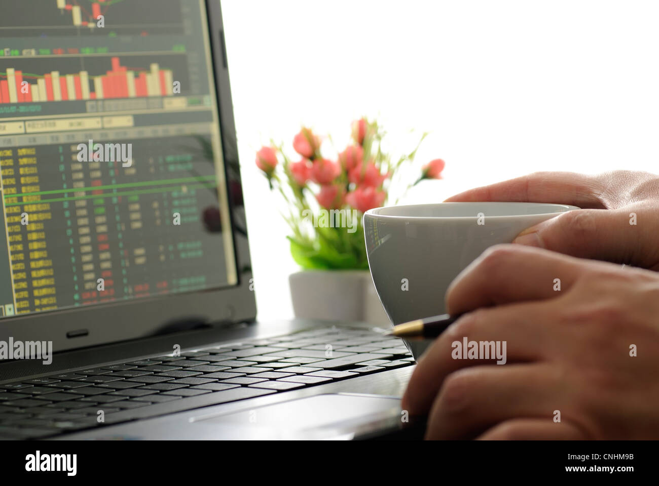 Business man checking stock diagram Stock Photo - Alamy