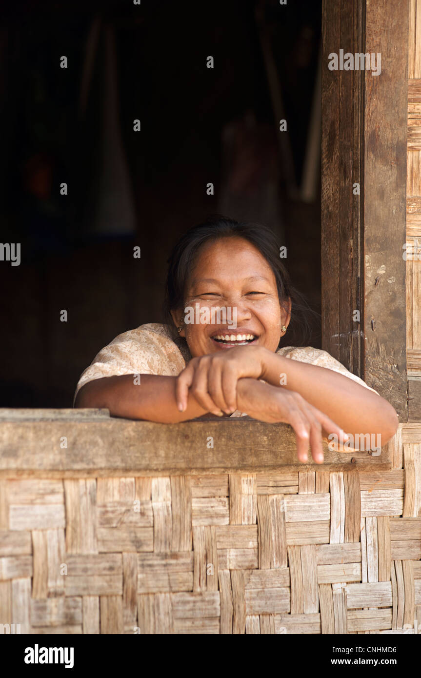 Burmese woman with distinctve Burmese make up called Thanaka on her ...