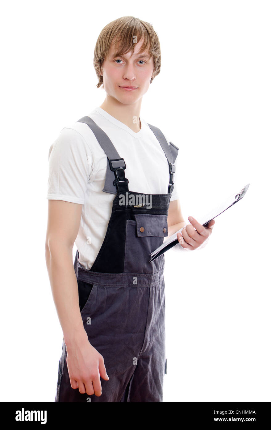 Young warehouse worker with notepad. Isolated on white background Stock ...