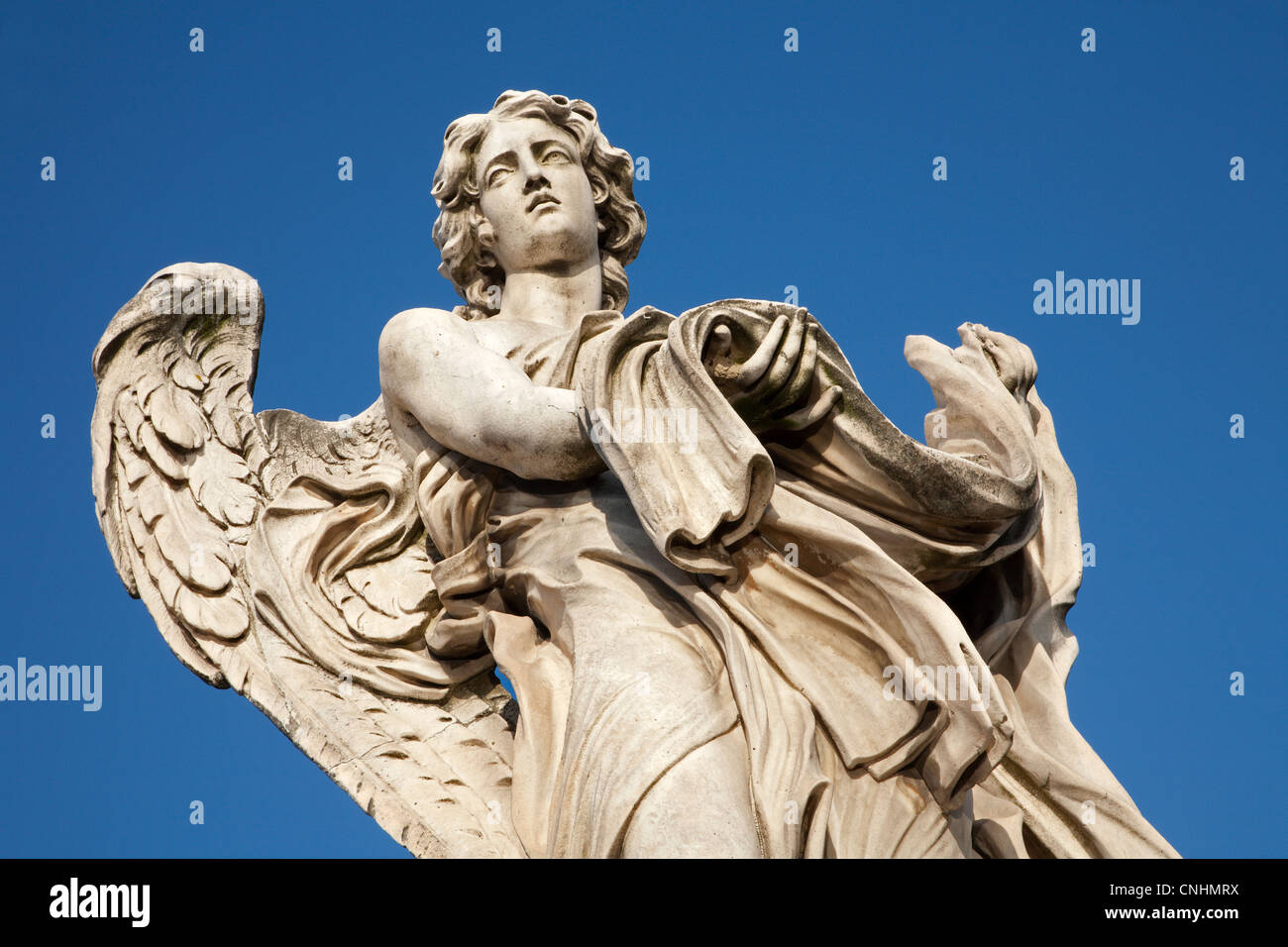 Rome - Angel with garment and dice Stock Photo - Alamy