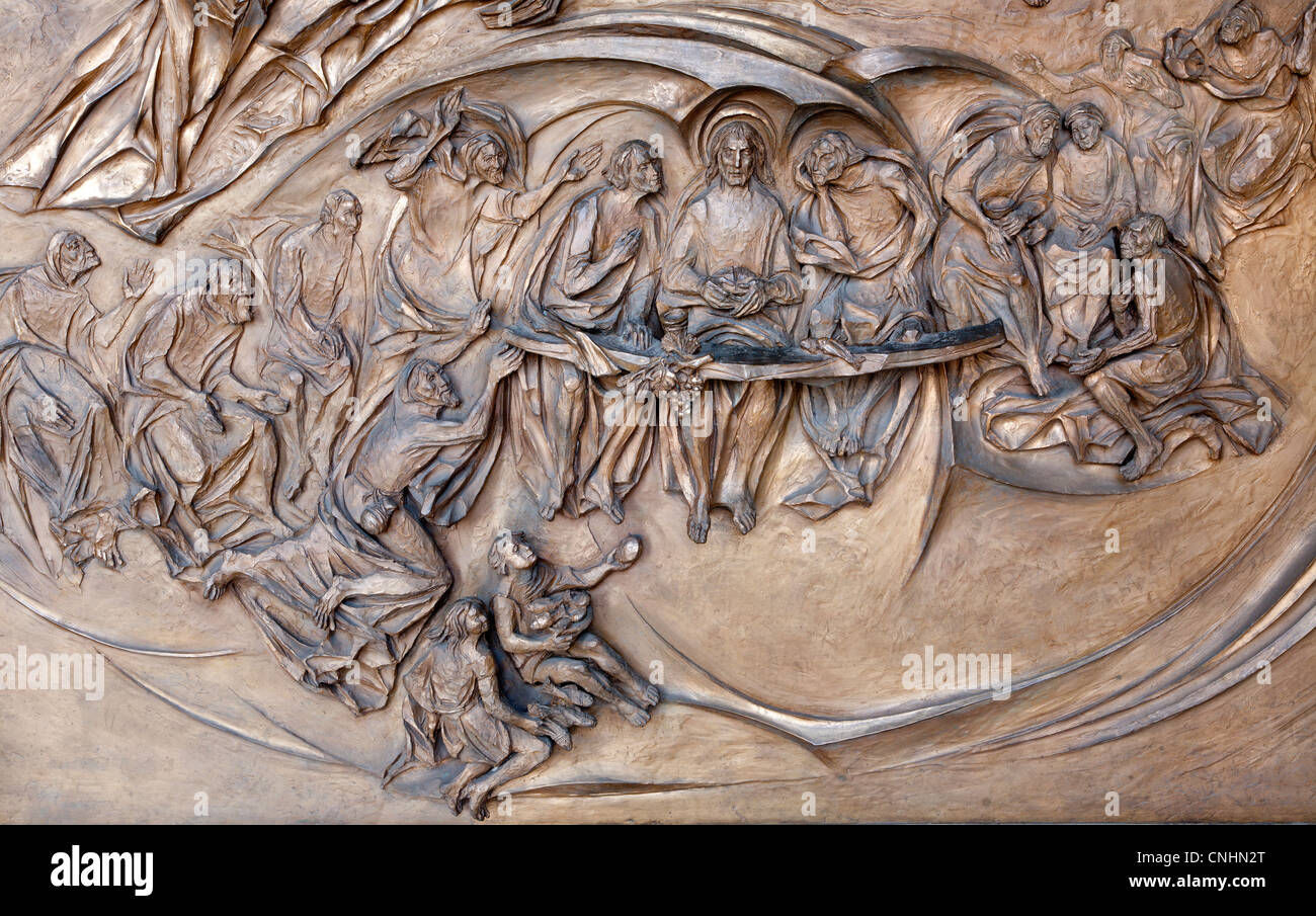 Rome - Last supper of Christ - detail from modern gate of basilica ...