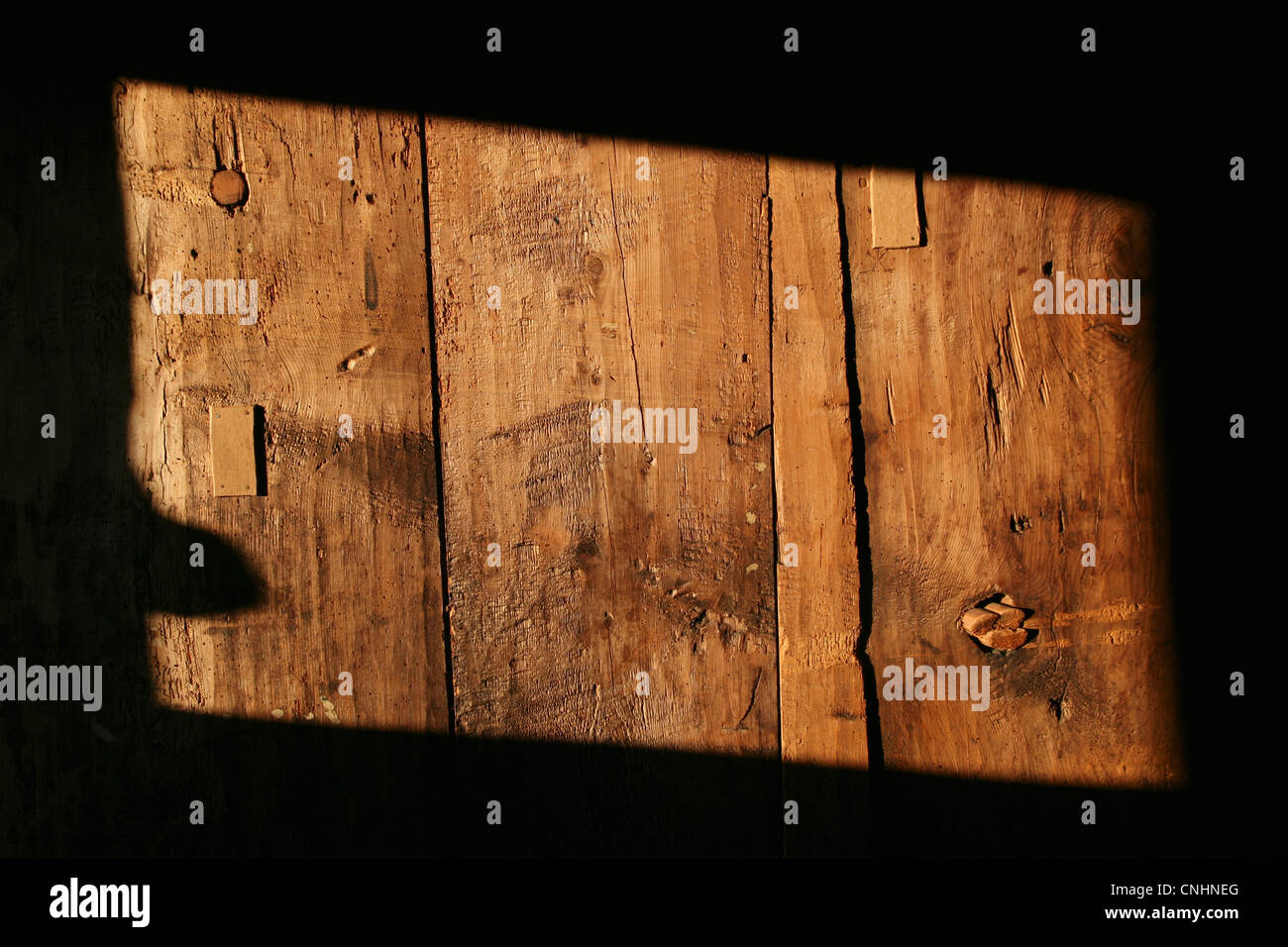 A rectangle shape of sunlight on a wooden structure, close-up Stock ...