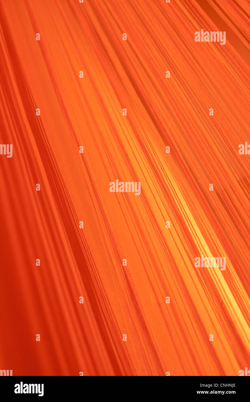Lined gradient of orange Stock Photo - Alamy