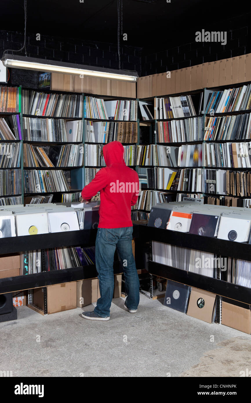 Searching through records hi-res stock photography and images - Alamy