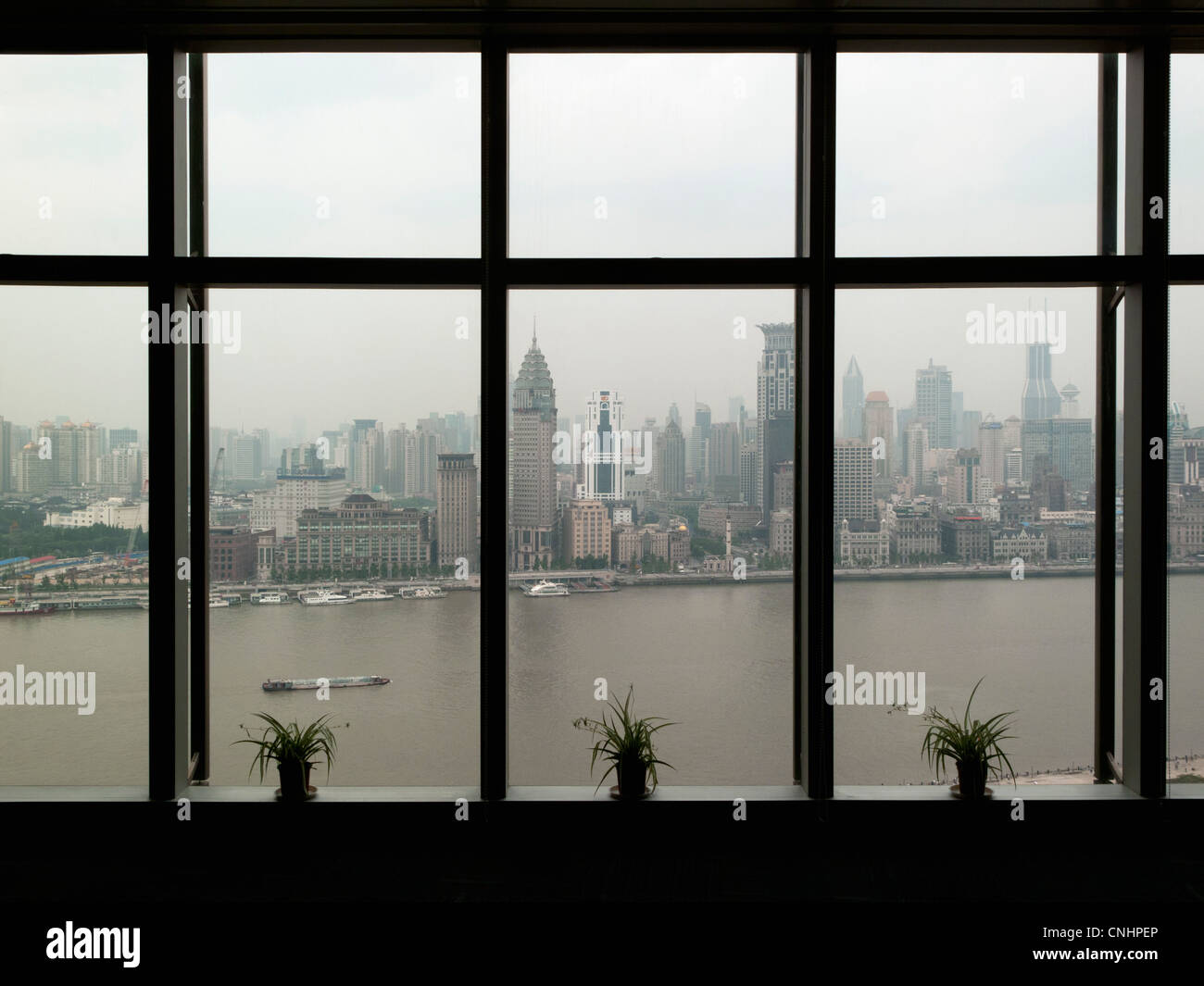 Shanghai skyline seen through window Stock Photo - Alamy