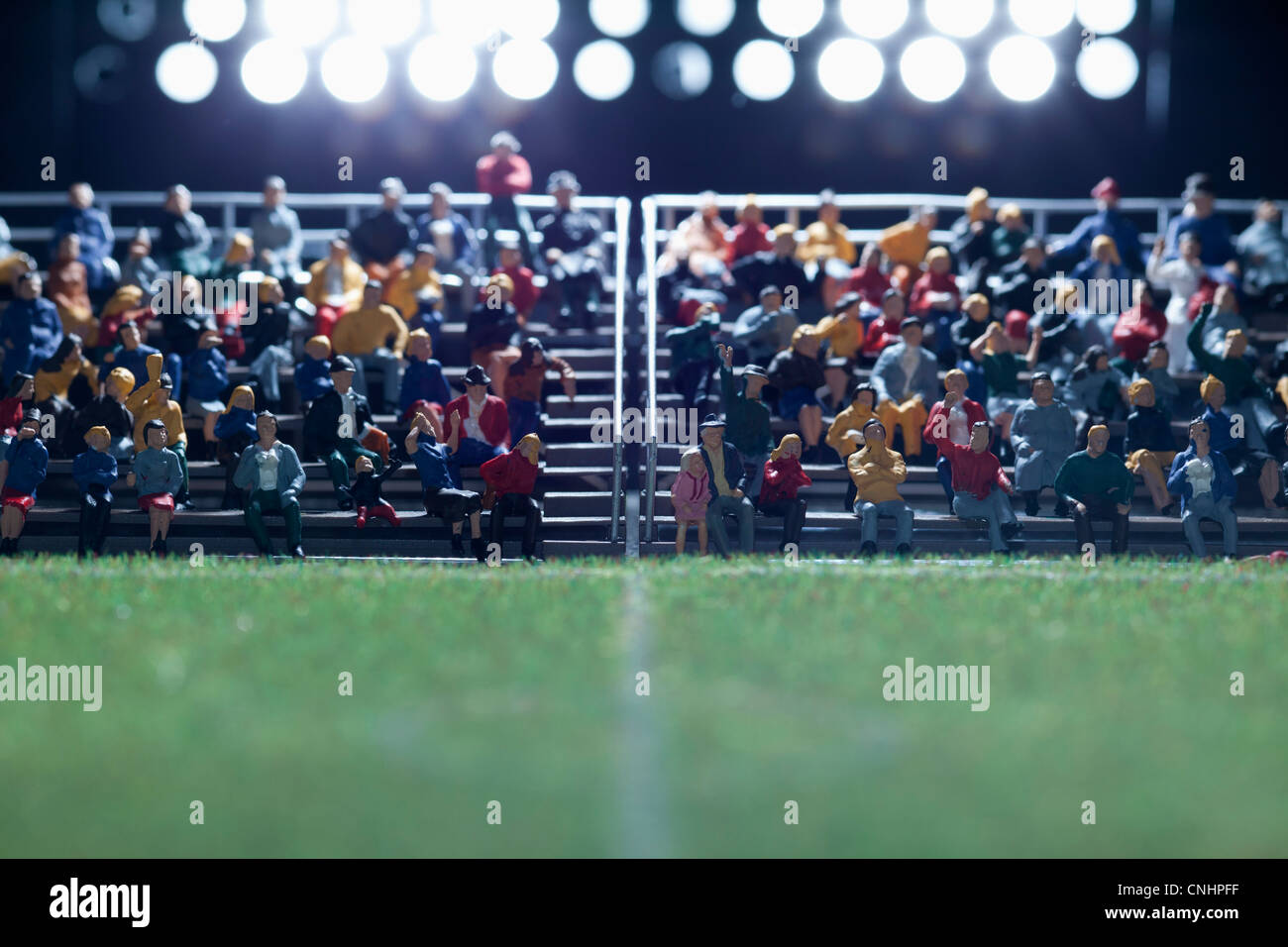The center field of a miniature soccer field, spectator figurines in ...