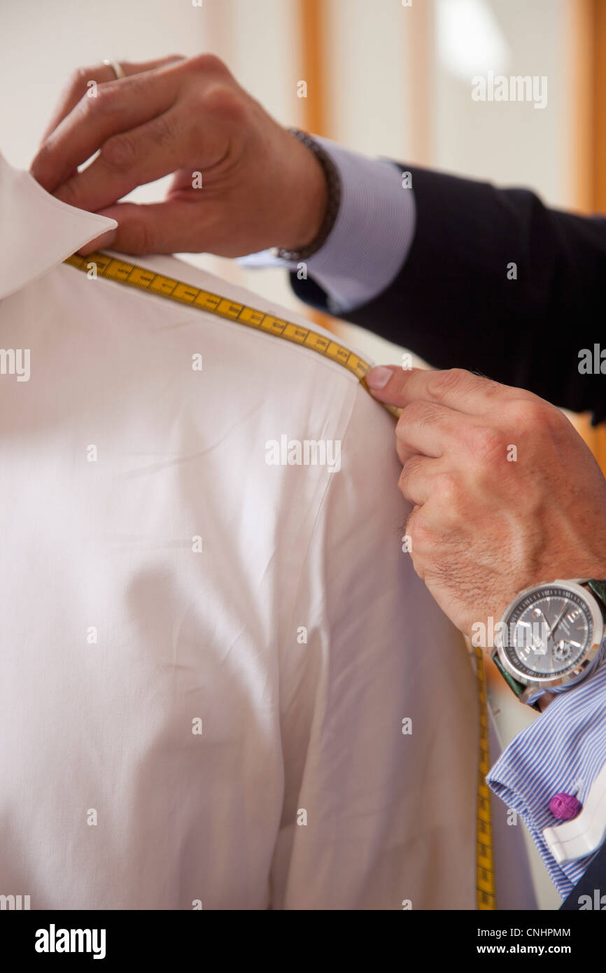 Tailor measuring hi-res stock photography and images - Alamy