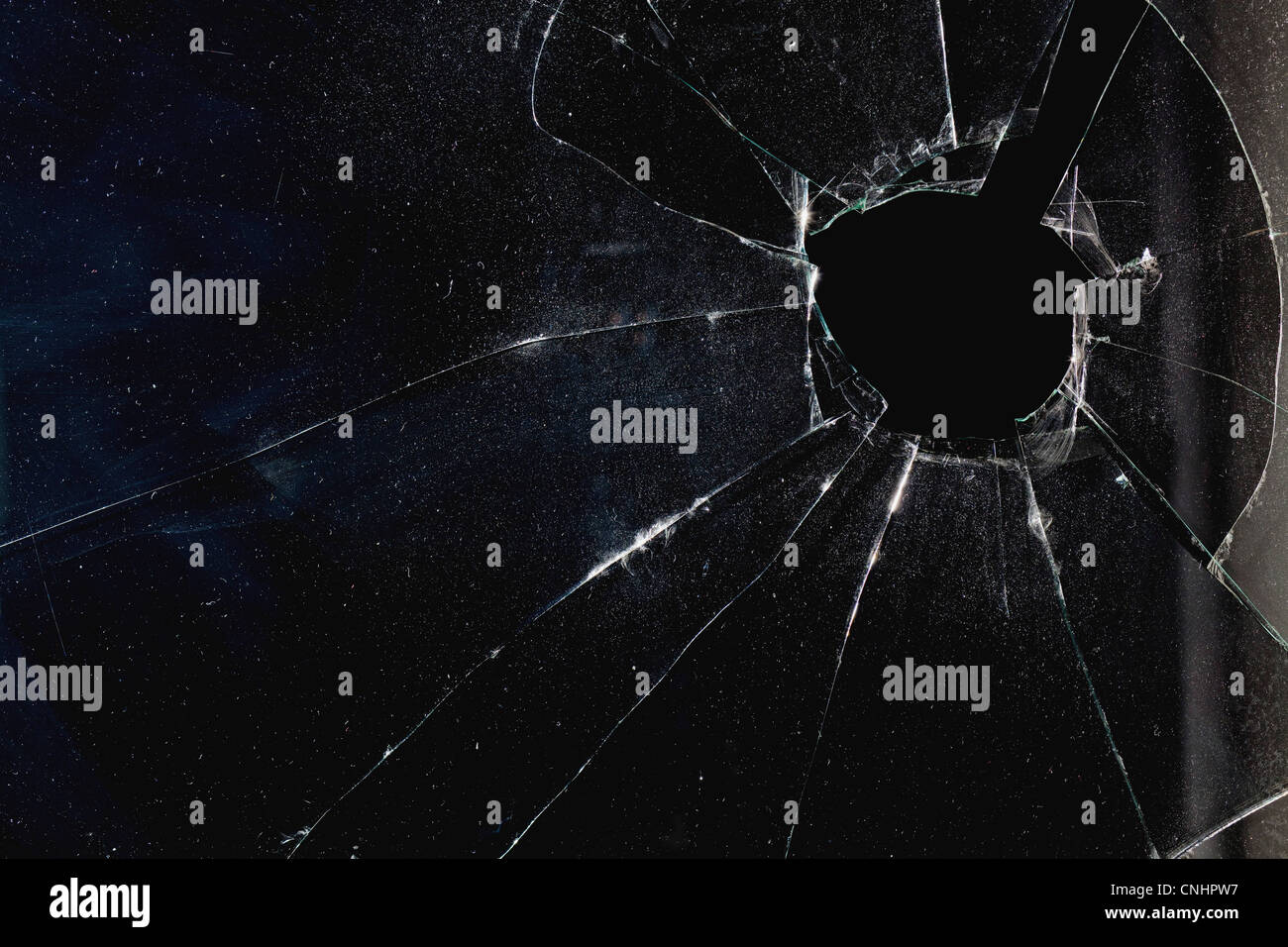 Broken glass hole hi-res stock photography and images - Alamy