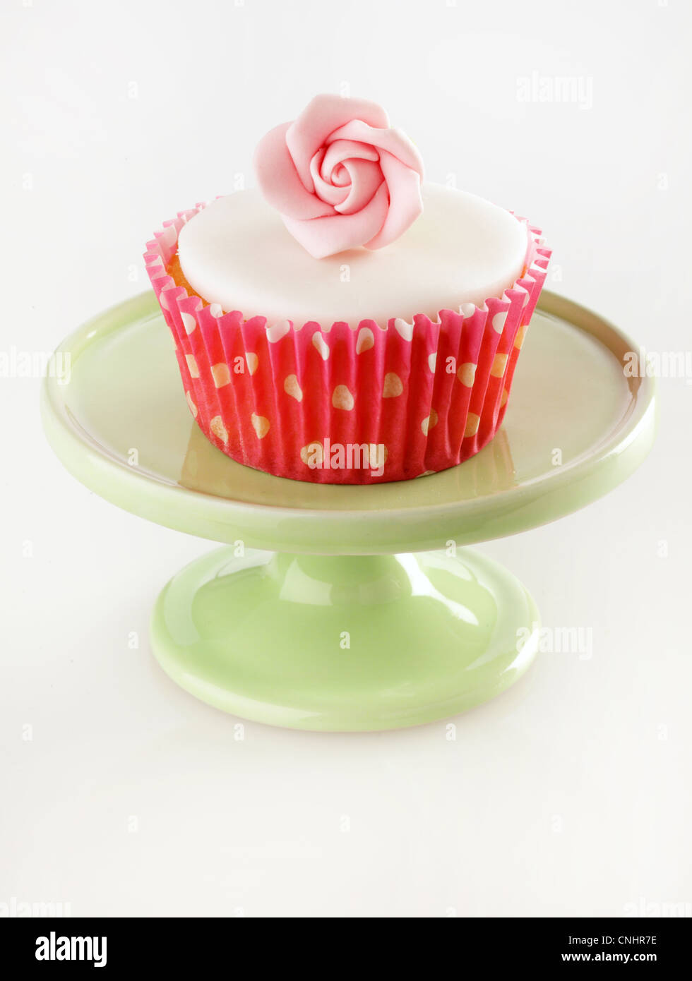 ONE PINK ROSE CUPCAKE Stock Photo - Alamy