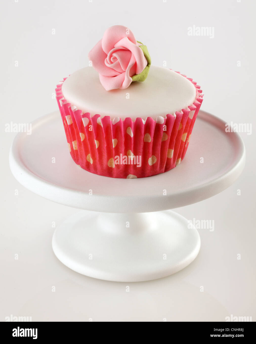 ONE PINK ROSE CUPCAKE Stock Photo - Alamy