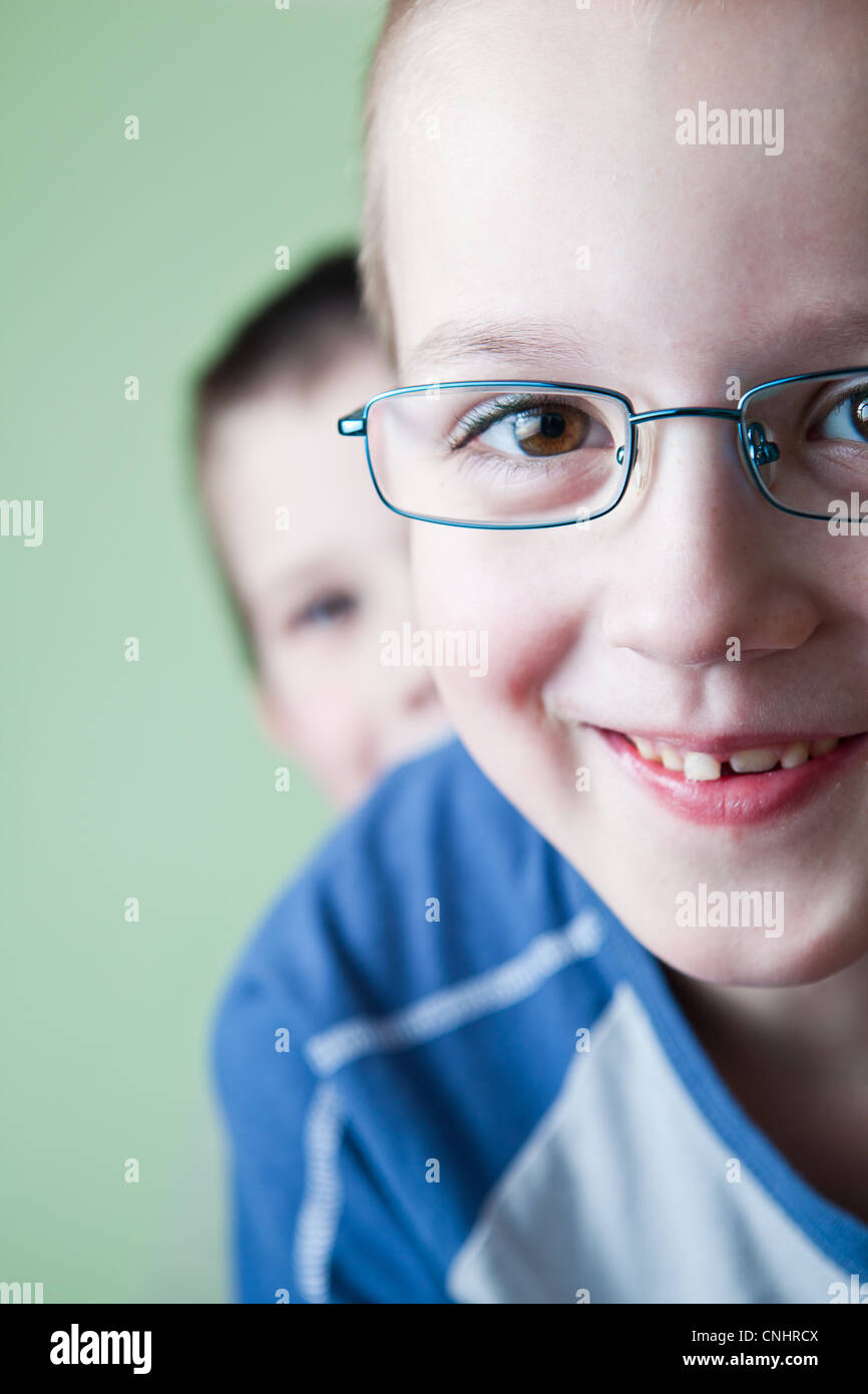 two little brothers happy together (shallow DOF; color toned image ...