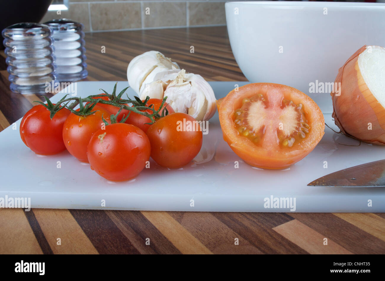 Tomatoes in the kitchen Stock Photo - Alamy