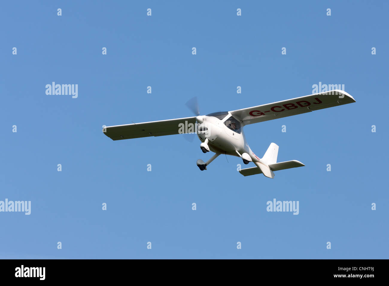 Flight Design CT2K G-CBDJ in flight at Breighton Airfield Stock Photo ...