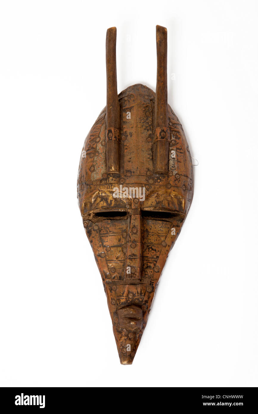 African Mask from Ivory Coast - wood with metal plating Stock Photo - Alamy
