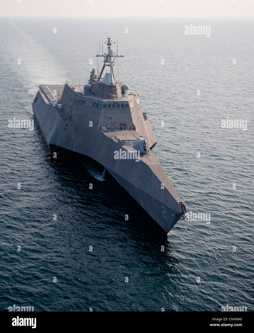 The new USS Independence, a littoral combat ship, steams through the ...
