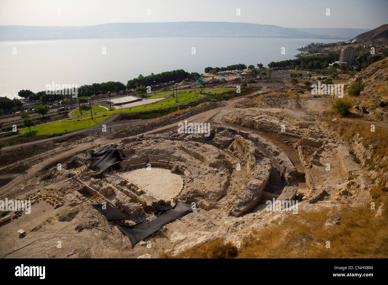 Aerial photograph of the ruins of a Roman amphitheater near the modern ...