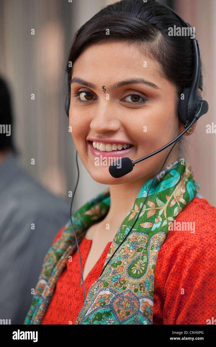 Portrait of a female call center agent Stock Photo - Alamy