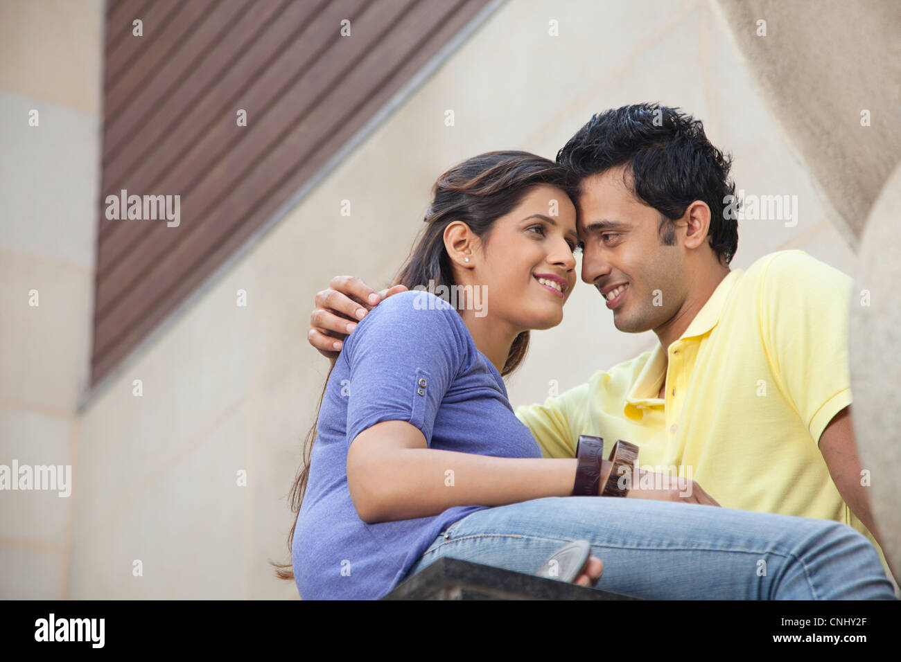 Couple getting close Stock Photo - Alamy