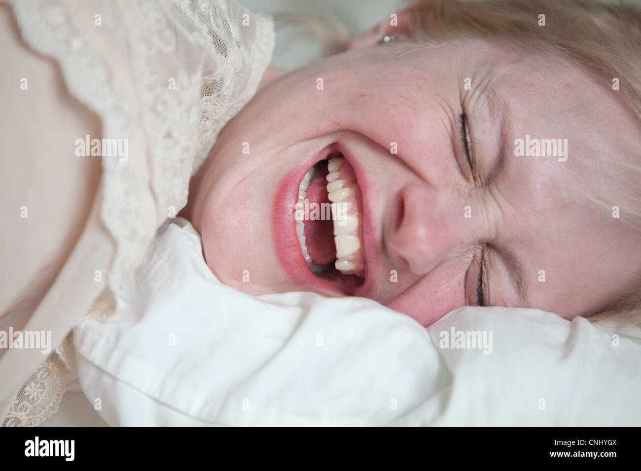 Face of young woman laughing Stock Photo - Alamy Face of young woman laughing Stock Photo - Alamy