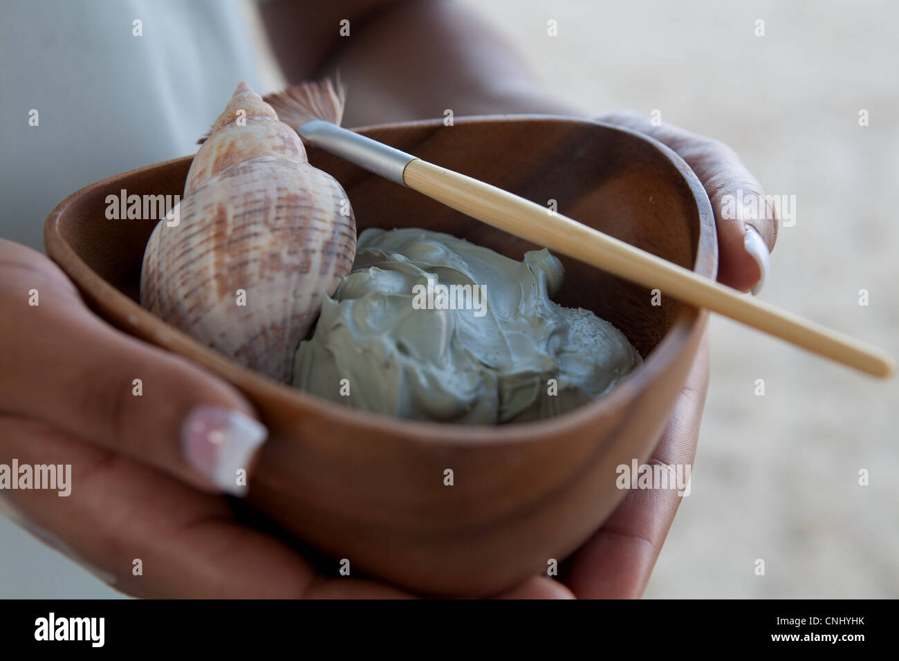 Person with shell hi-res stock photography and images - Alamy