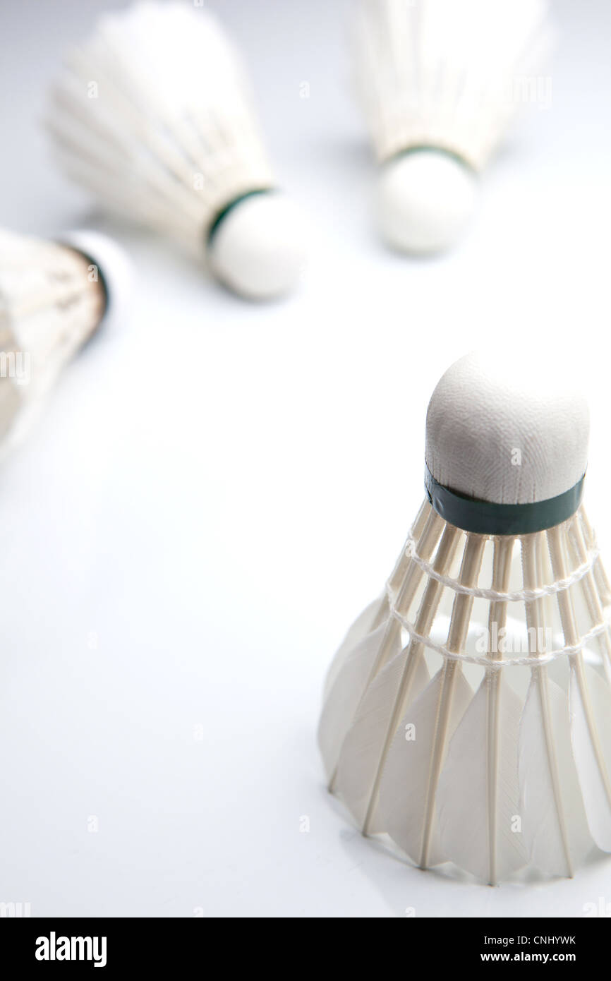 Badminton shuttlecocks on white (color toned image Stock Photo - Alamy