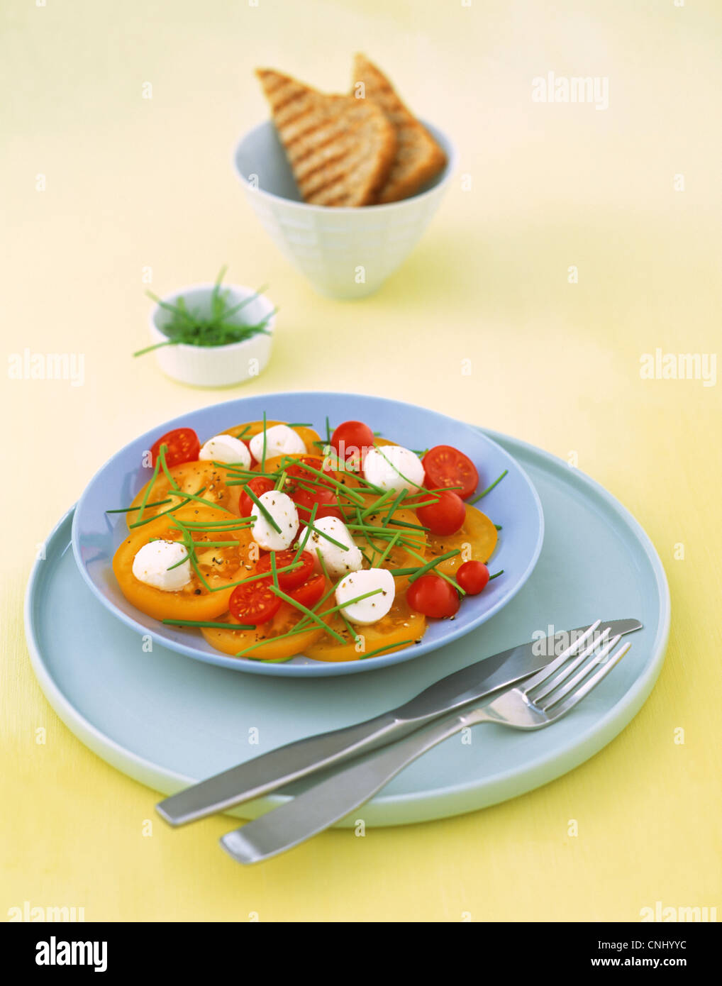 Mixed tomato salad Stock Photo - Alamy