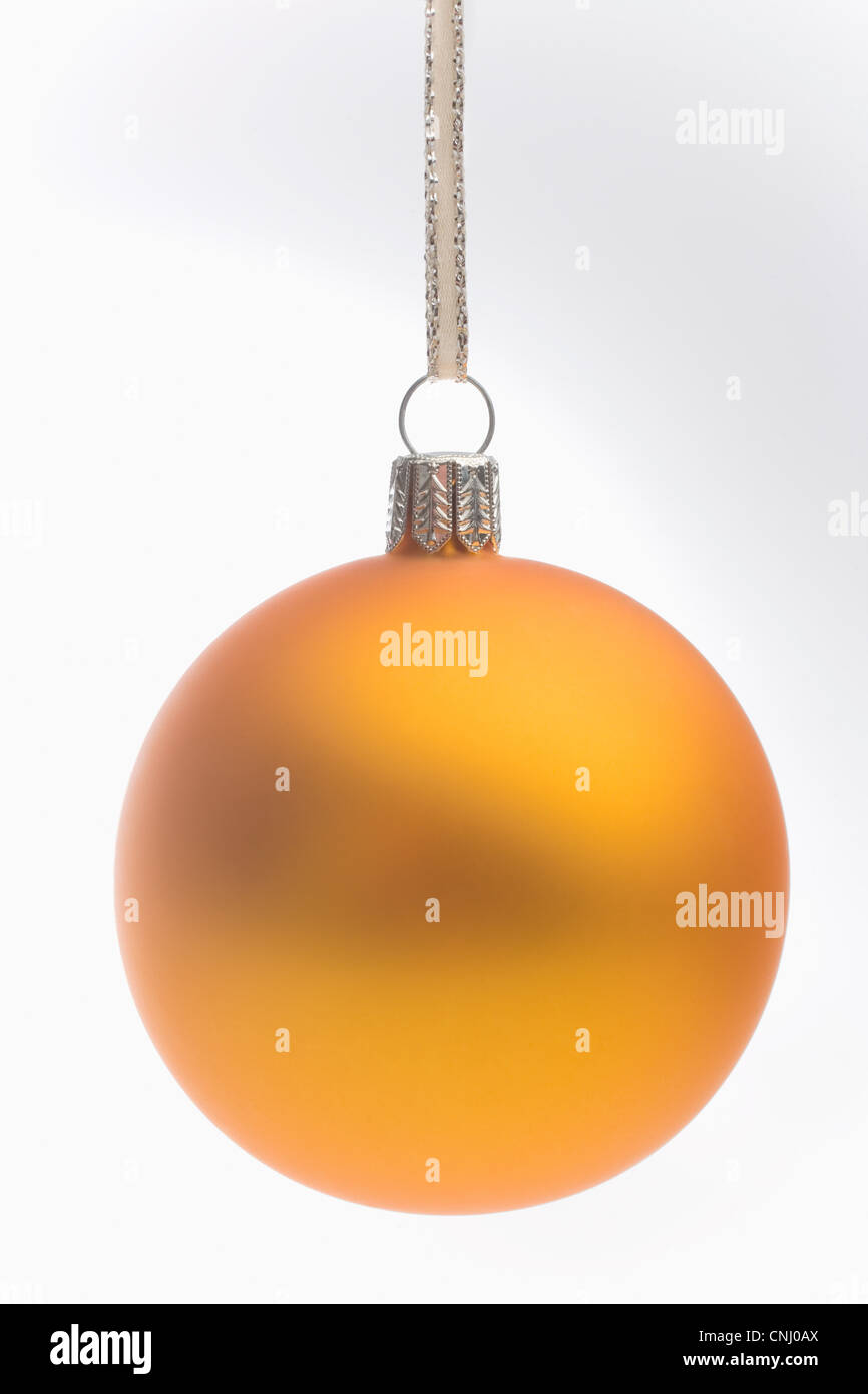 Yellow christmas bauble Stock Photo - Alamy