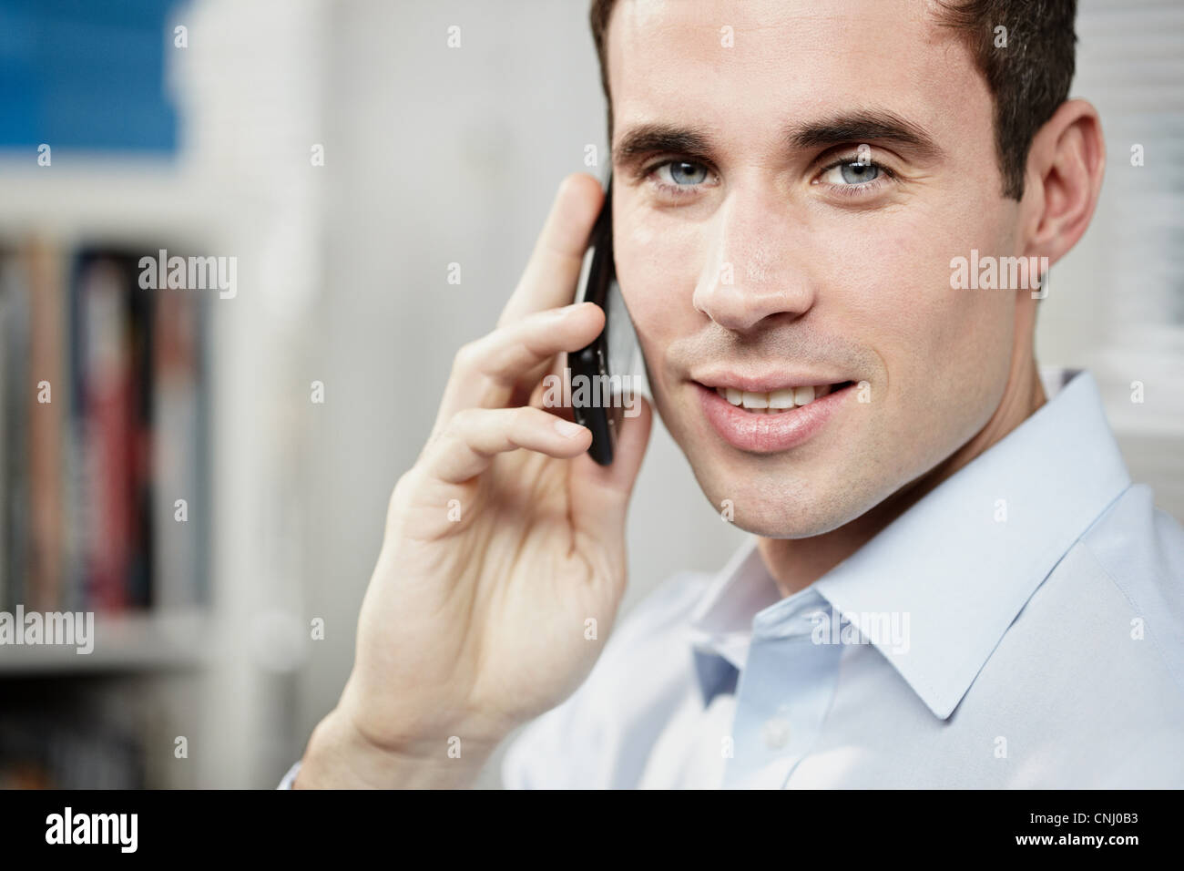 Office worker on cellphone Stock Photo - Alamy