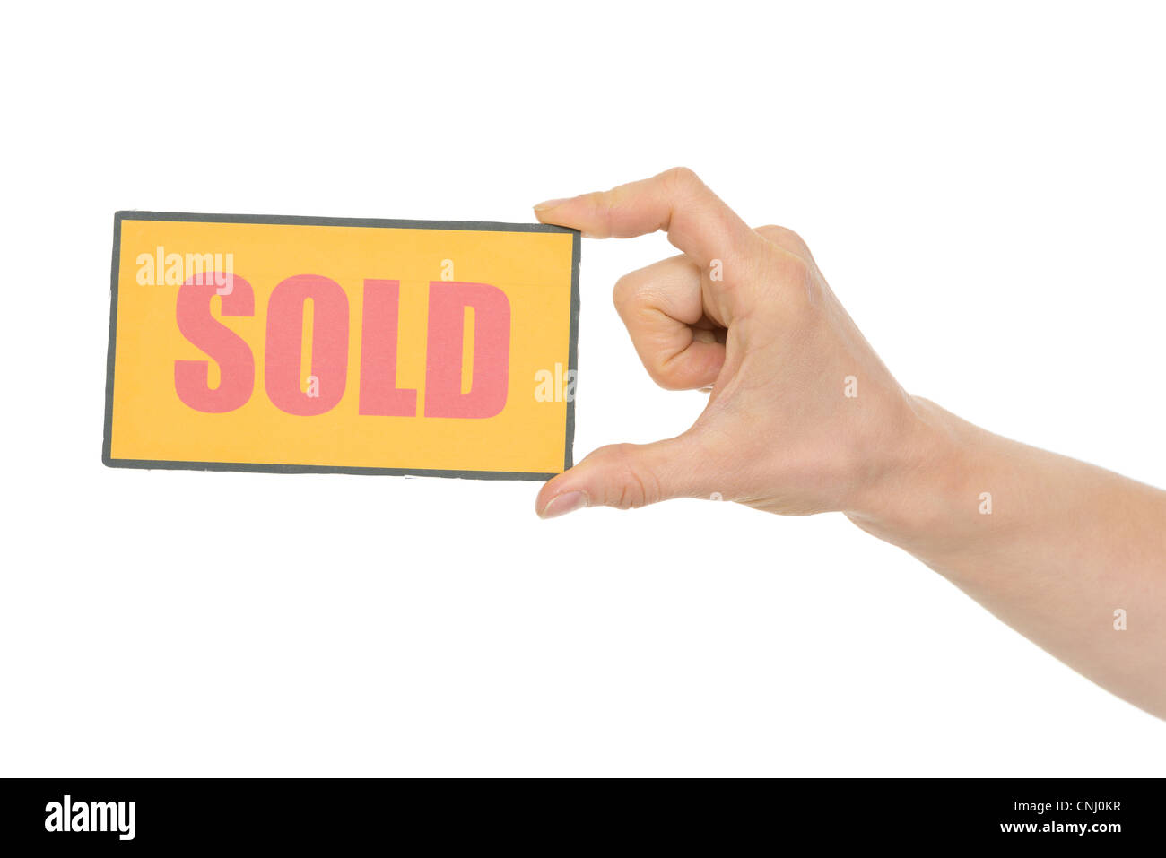 Woman holding sold sign hi-res stock photography and images - Alamy