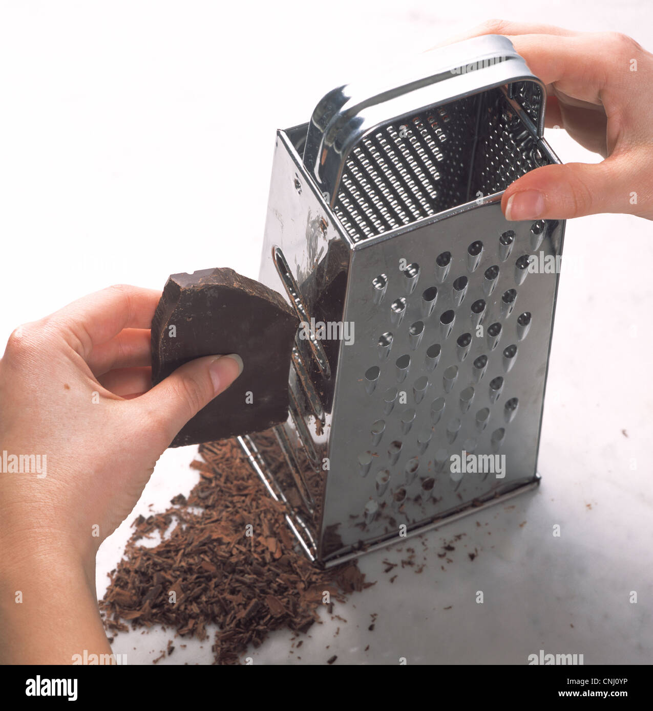 Grating chocolate hi-res stock photography and images - Alamy
