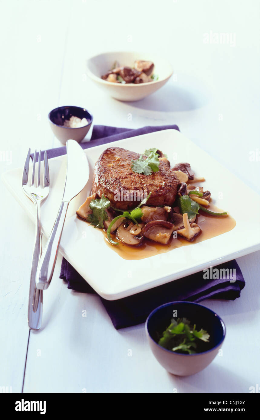 Fillet steaks with mushrooms (asian style Stock Photo - Alamy